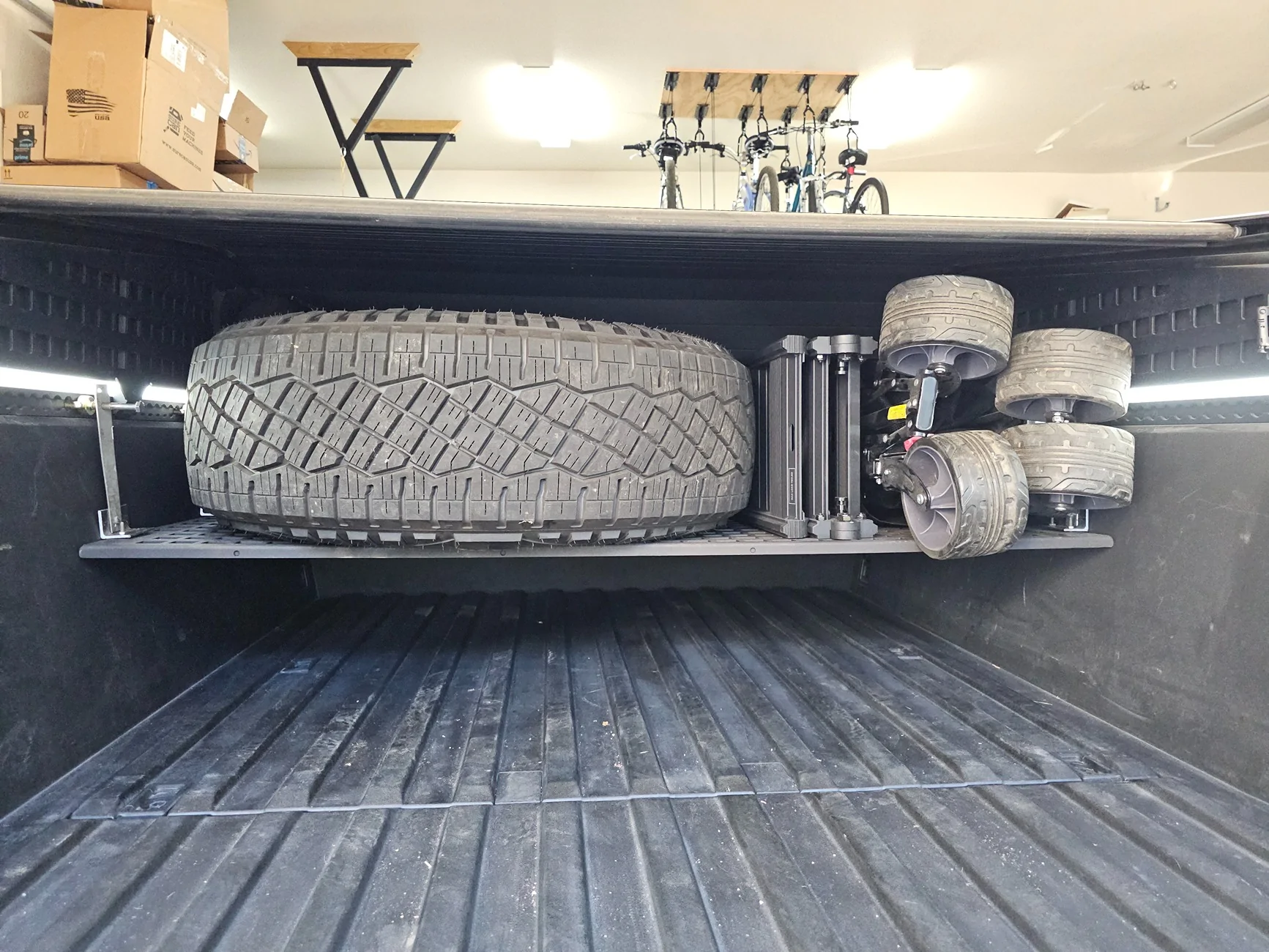 Spare tire mounting shelf option for bed vault (inexpensive but useful ...