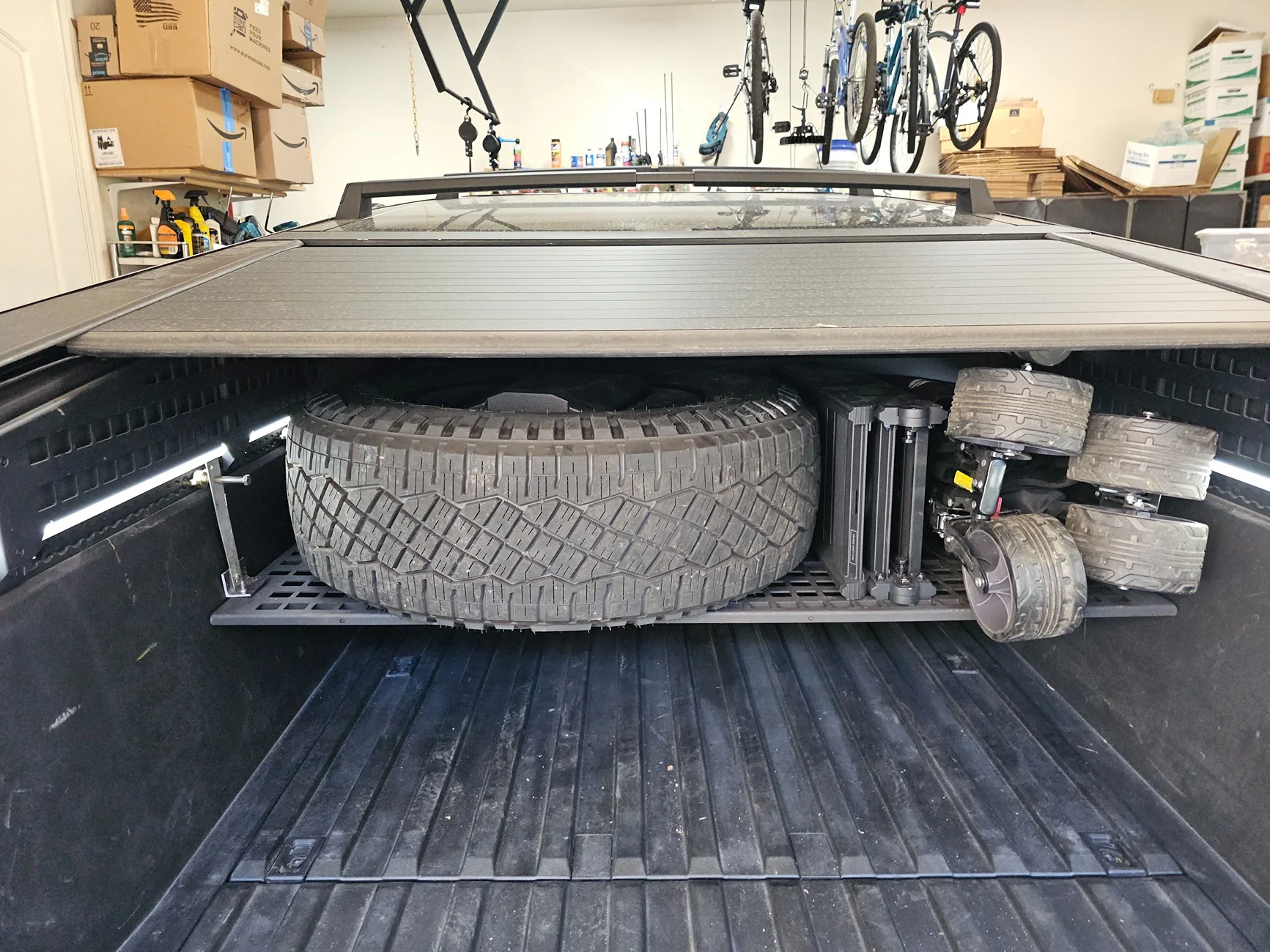 Spare tire mounting shelf option for bed vault (inexpensive but useful ...
