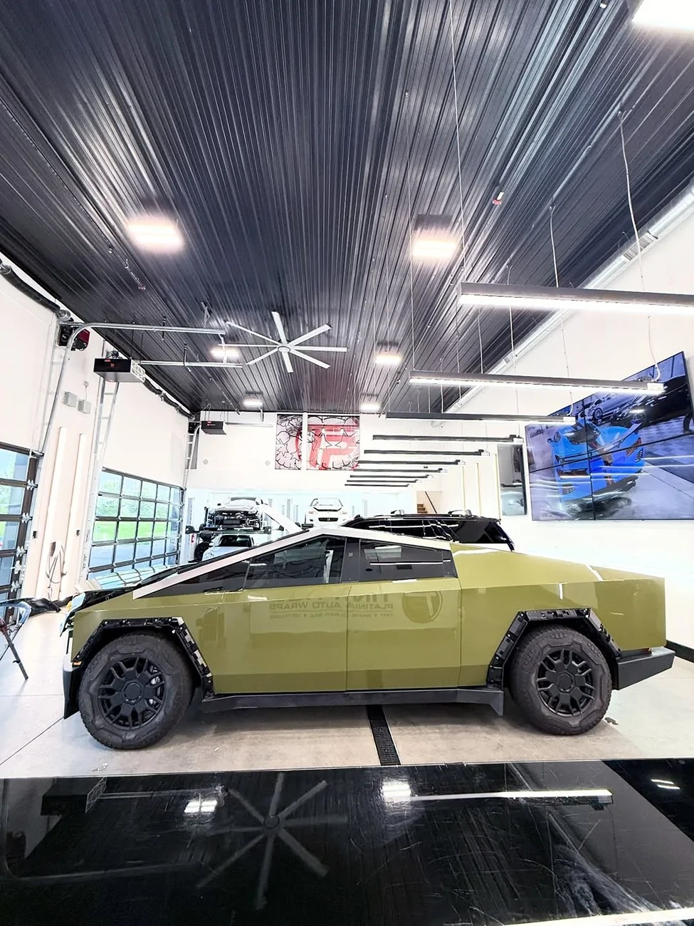 Pure PPF Sandstorm Green Cybertruck wrapped by TintPros | Tesla ...