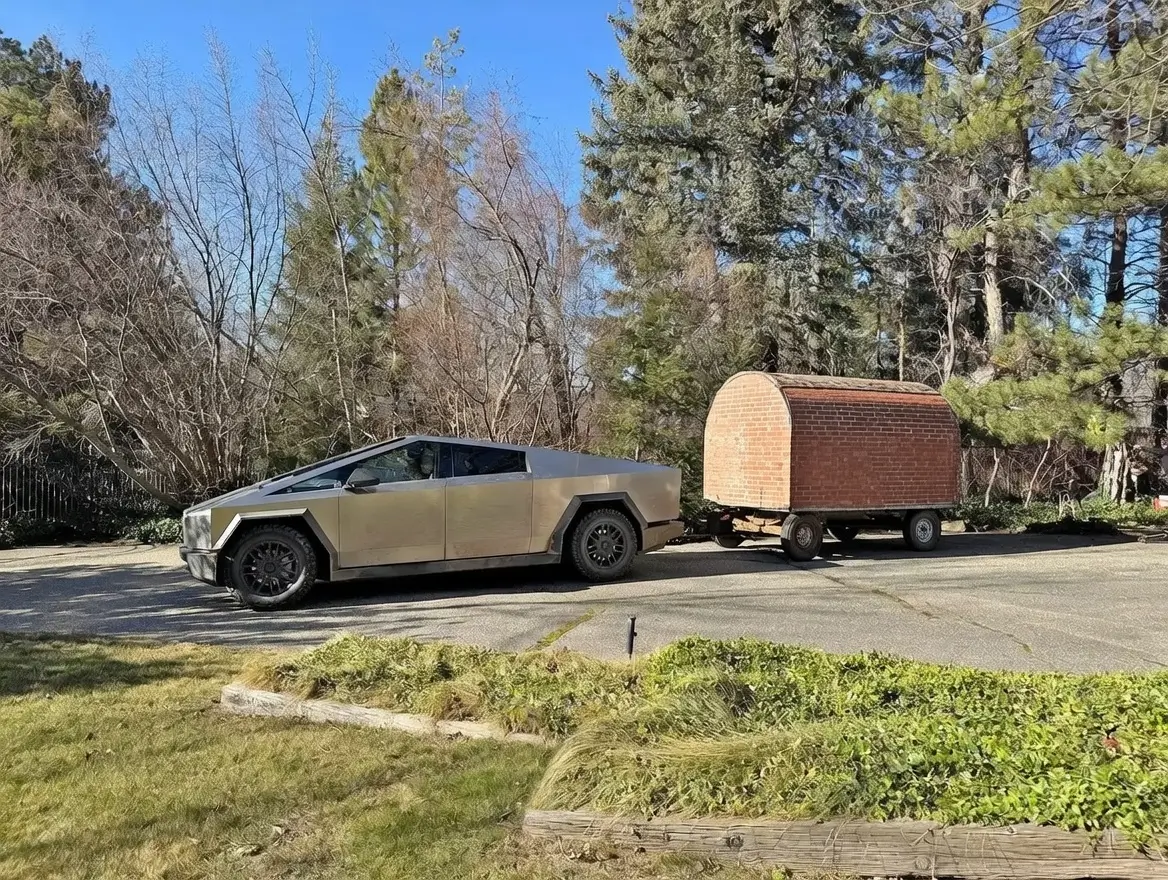 Future meets the past. Cybertruck tows vintage sheep camp trailer ...