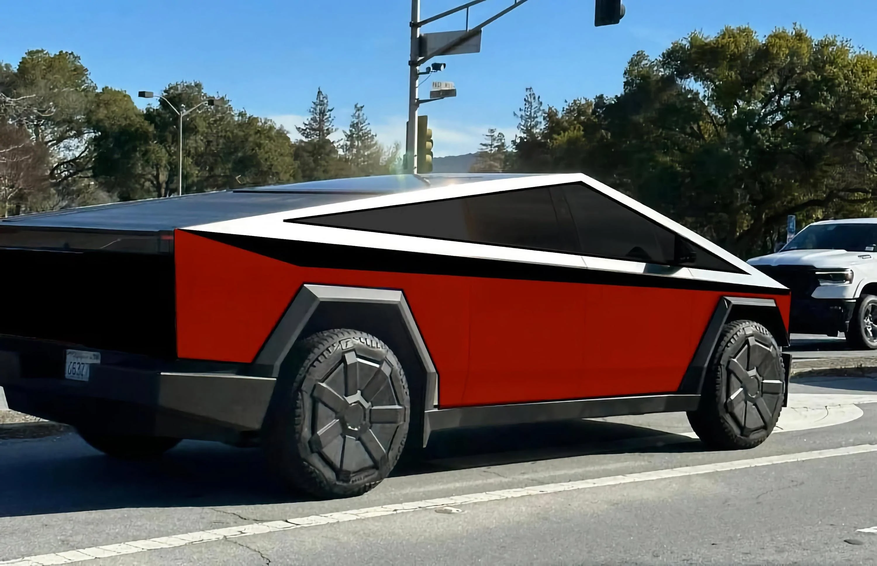 Dark Grey / Black Camo wrapped Cybertruck looks awesome | Tesla ...