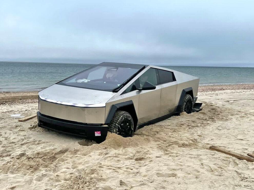 Another Cybertruck stuck on beach = PSA: air down tires + engage Sand ...