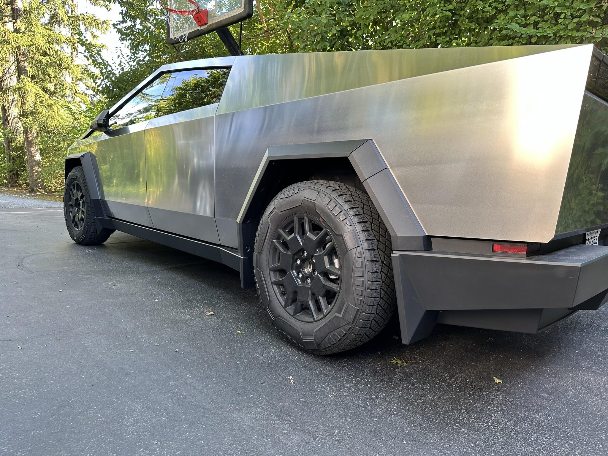 Pics: Tesla OEM Cybertruck Mud Flaps installed photos & review | Tesla ...