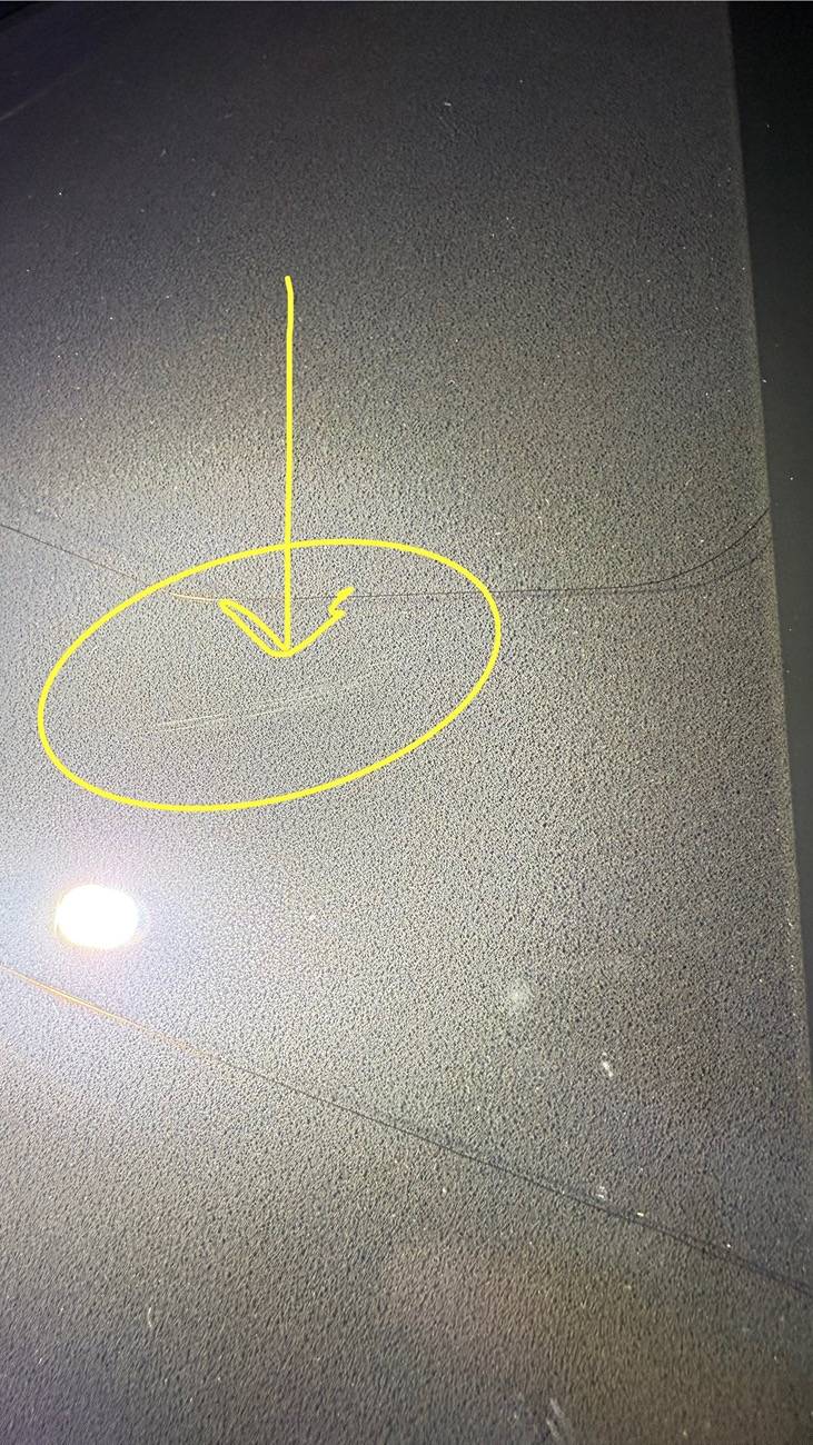 Glass (just cleaned at service) in front of camera has permanent haze ...